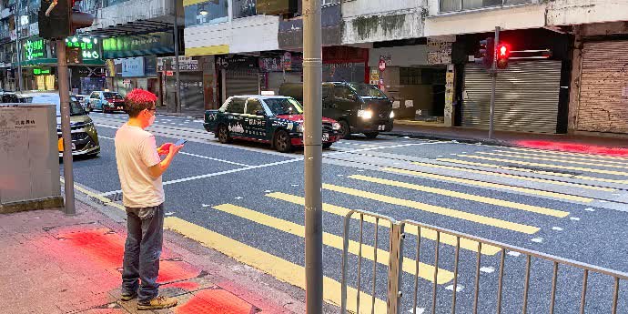 Red light projection devices installed at 21 junctions in HK