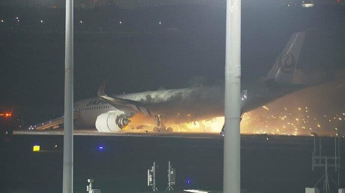 JAL plane catches fire after landing at Tokyo's Haneda Airport