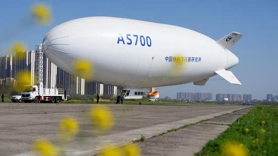 China's homegrown airship AS700 completes first trial flight in Hubei ...