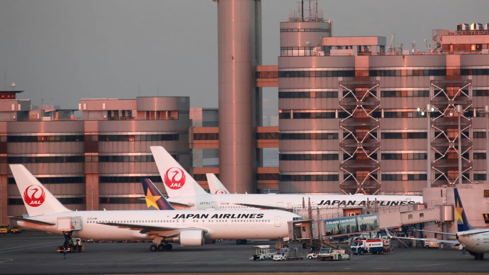 Wings of 2 JAL planes collide at Haneda Airport